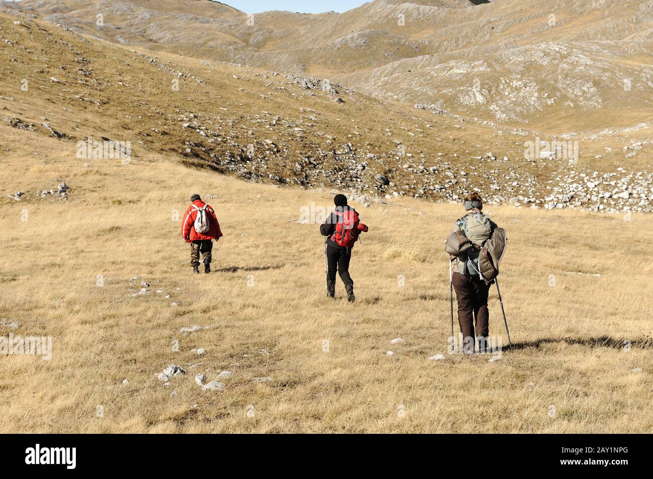 Sport hiking in mountains, walking and backpacking Stock Photo - Alamy