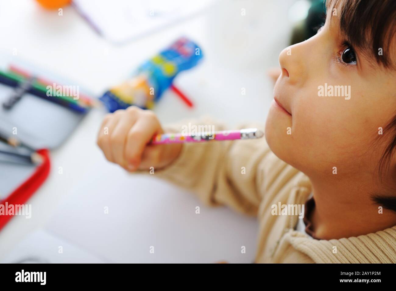 Learning process, cute child Stock Photo - Alamy