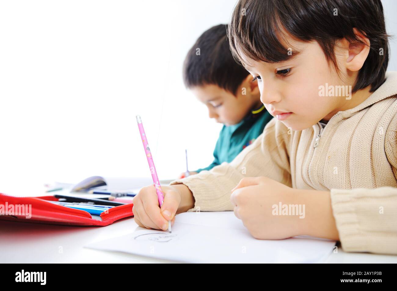 Learning process, cute children Stock Photo - Alamy