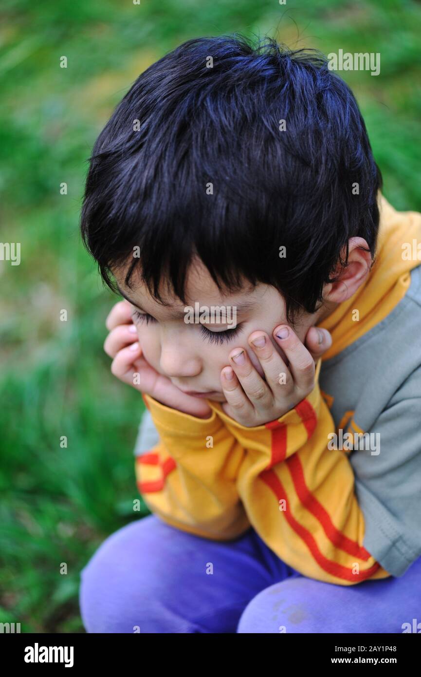 sad children in nature outdoor Stock Photo - Alamy