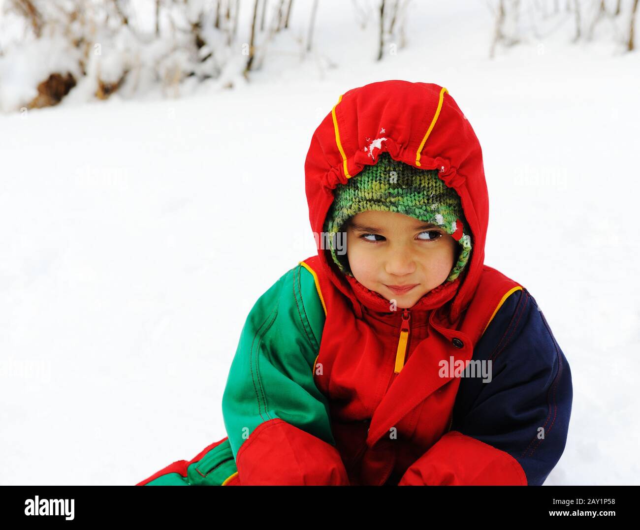 Happy kid face in snow hi-res stock photography and images - Alamy