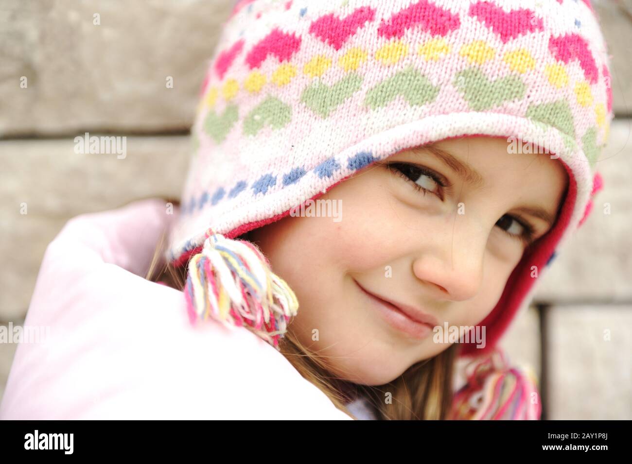 Adorable little girl with positive smiling face Stock Photo - Alamy