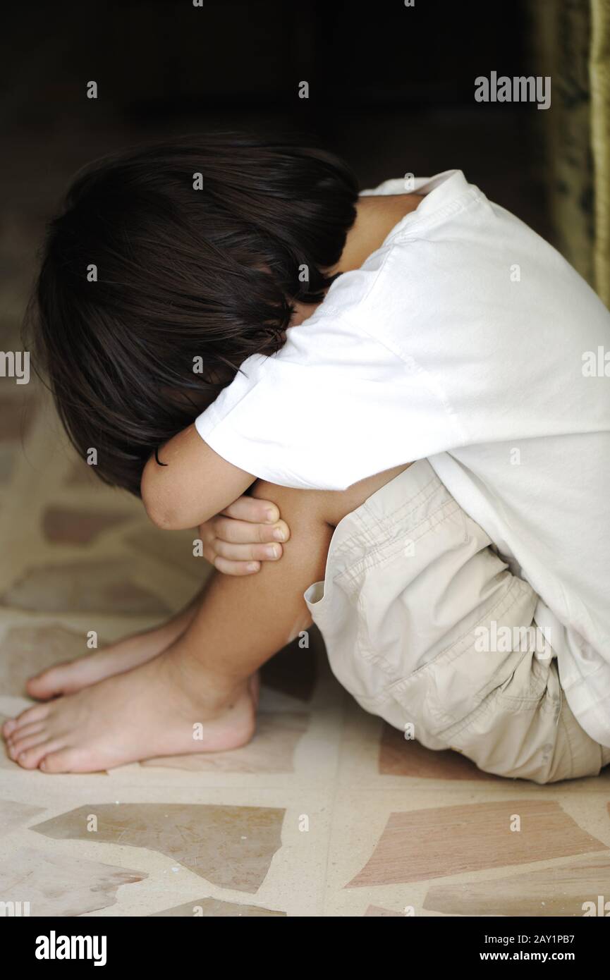 Lonely alone kid Stock Photo - Alamy