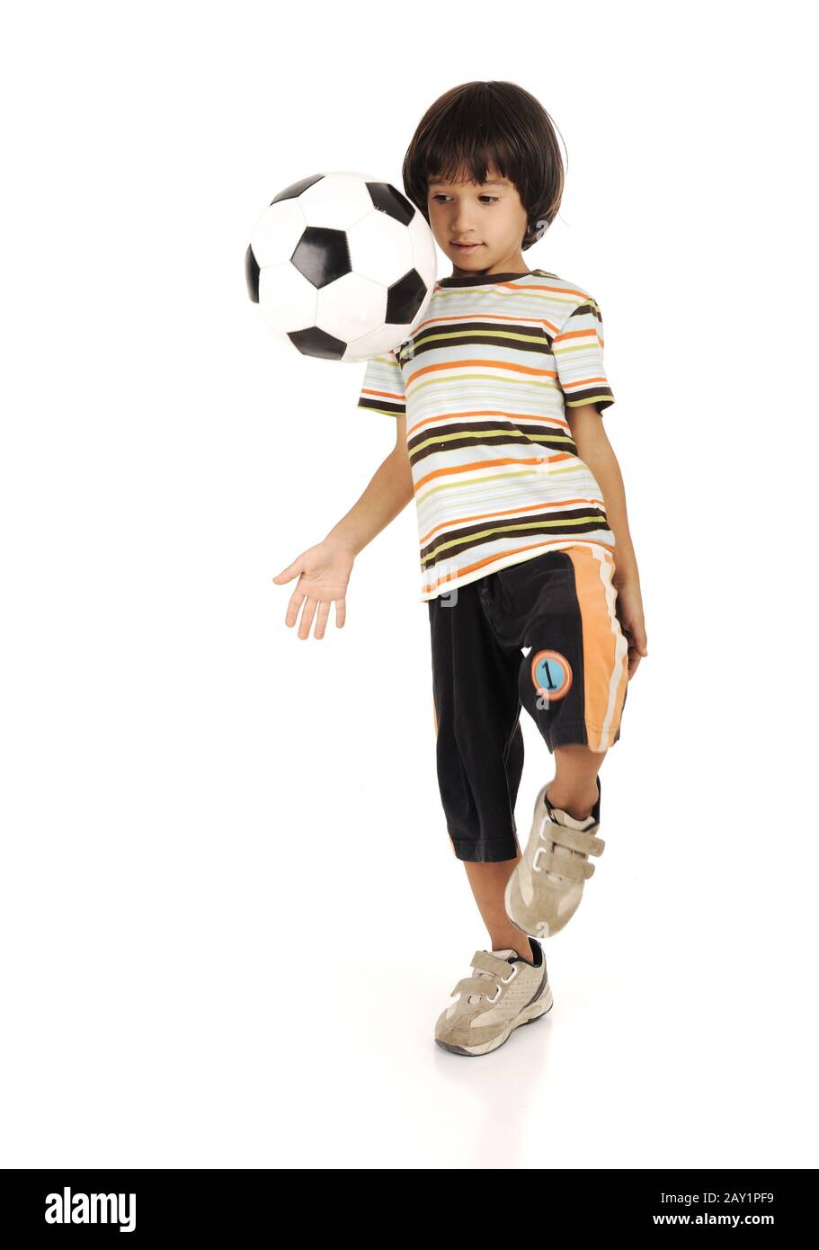 Little boy playing football isolated on white background Stock Photo ...