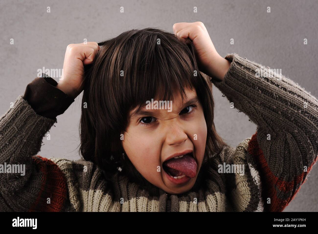 One kid - many faces Stock Photo - Alamy