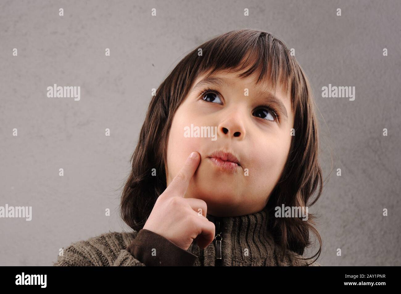 One kid - many faces Stock Photo - Alamy