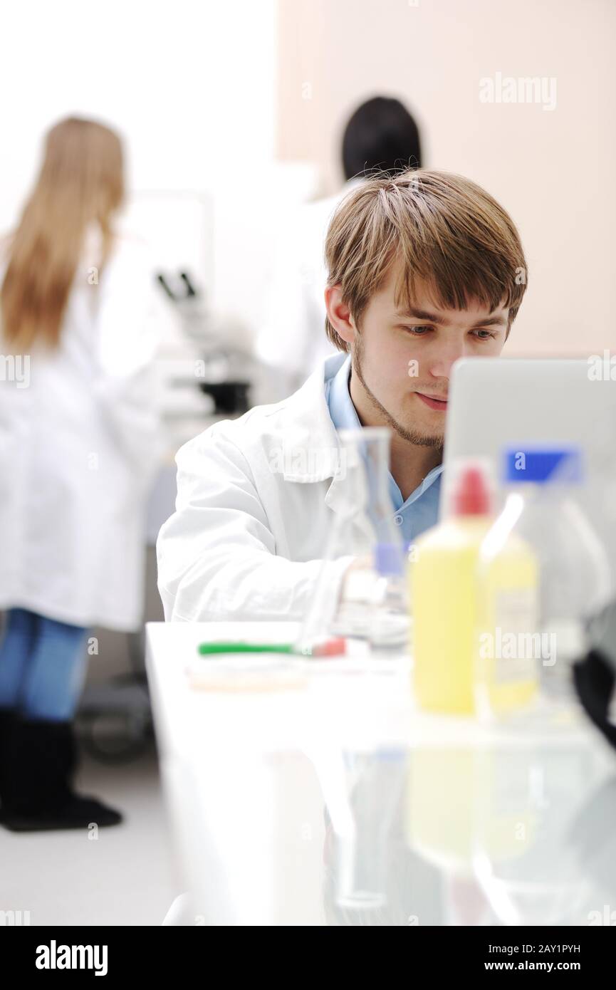 Successful teamwork inside the lab Stock Photo - Alamy