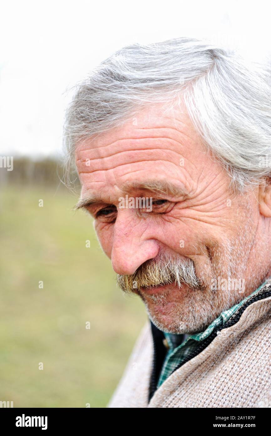 Elderly person, portrait in natural pose Stock Photo - Alamy