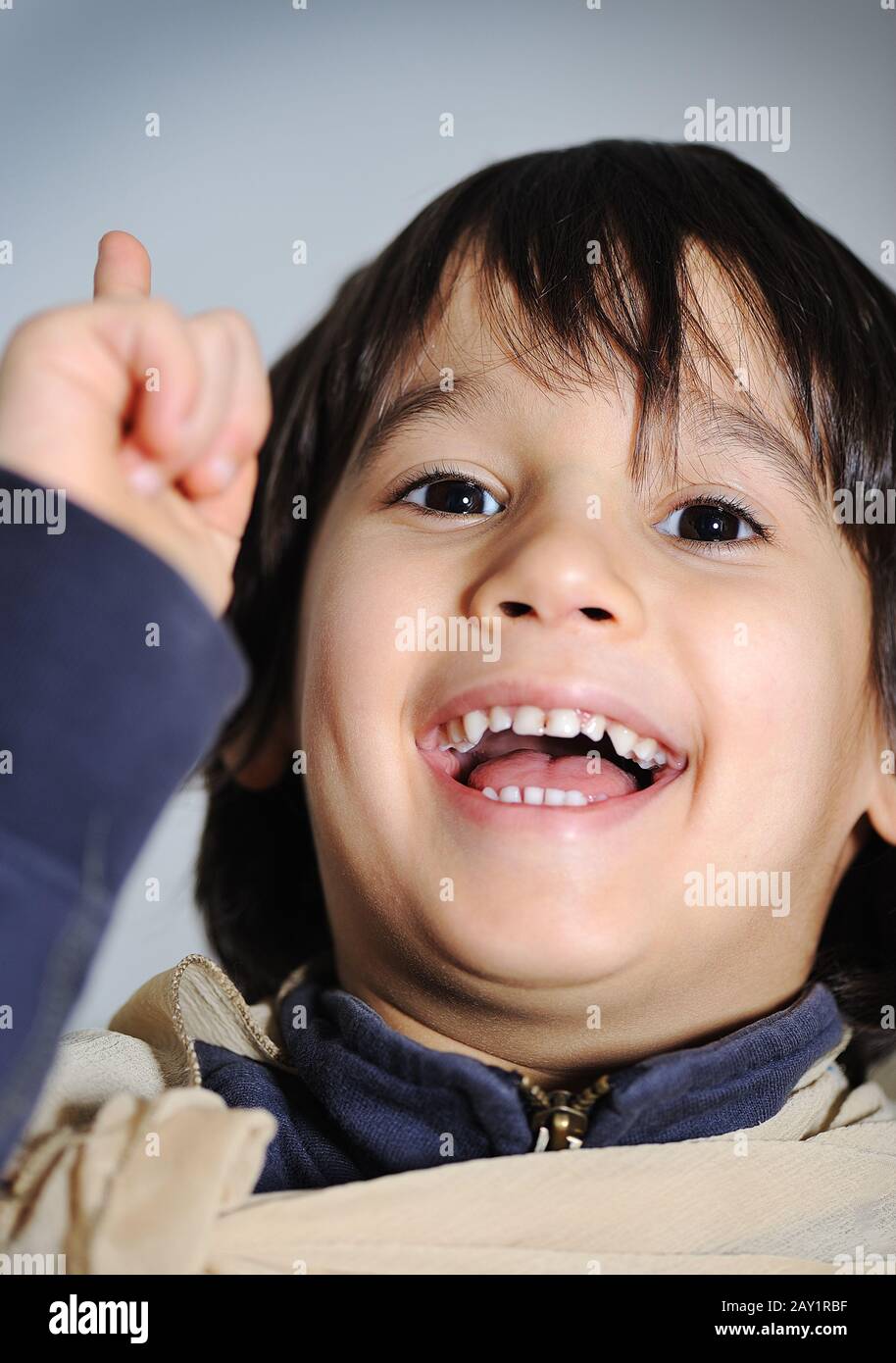 Very positive and cute kid Stock Photo - Alamy