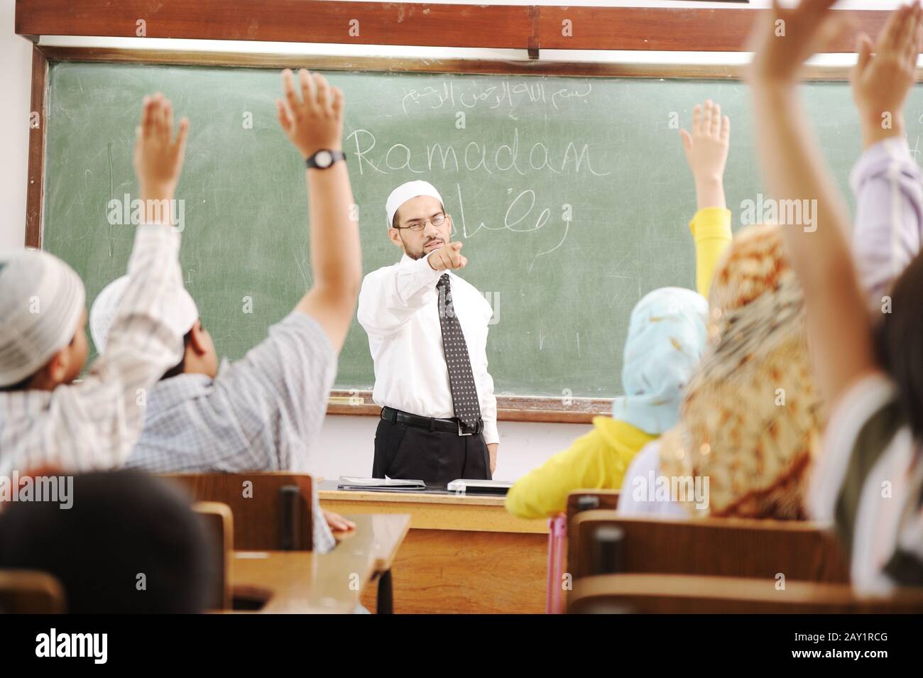 Muslim teacher classroom hi-res stock photography and images - Alamy