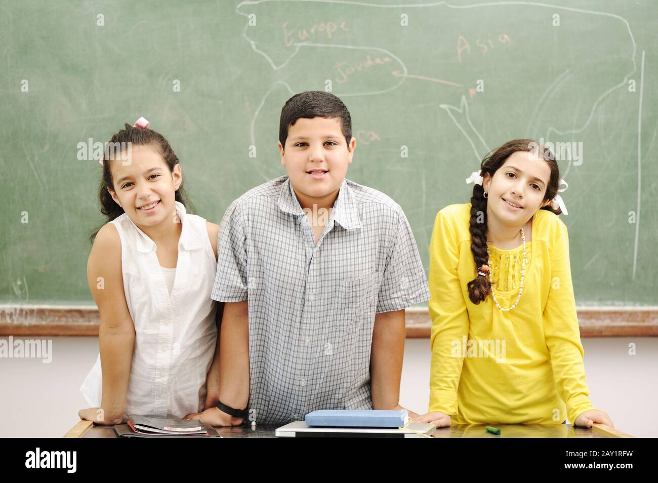 Education activities in classroom at school, happy children learning ...