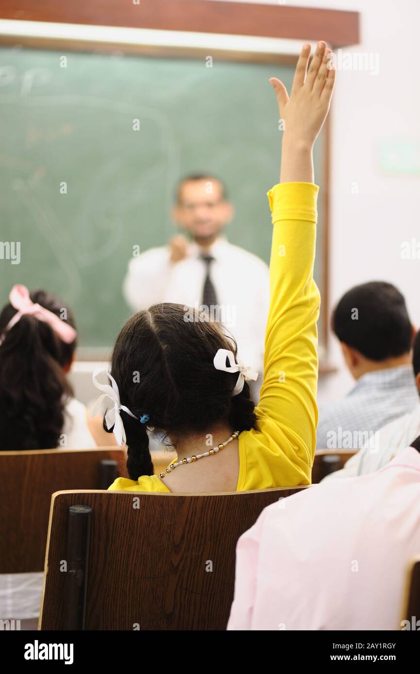 Competition between children at classroom Stock Photo - Alamy