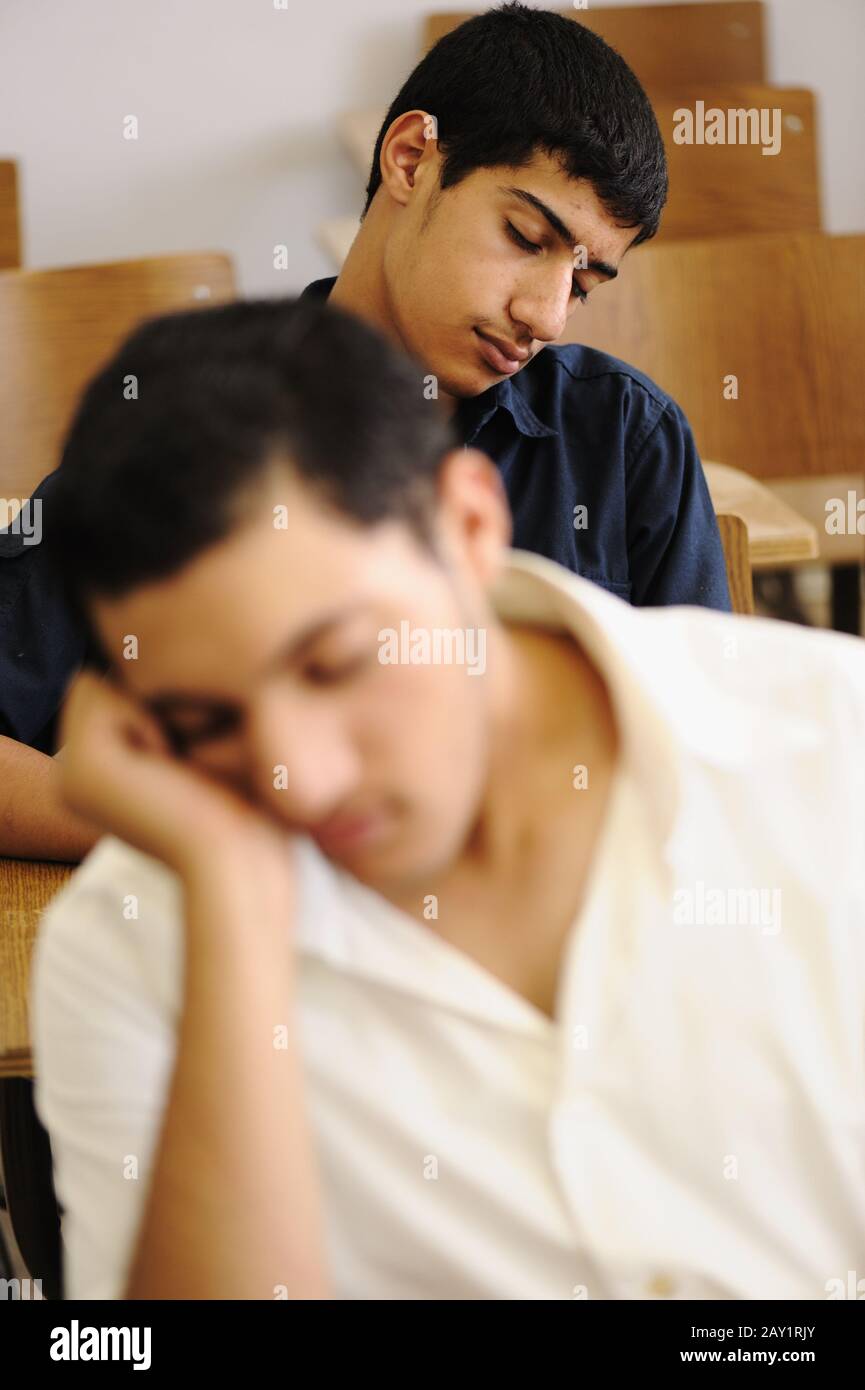 Teen student sleeping at lecture time, college Stock Photo - Alamy