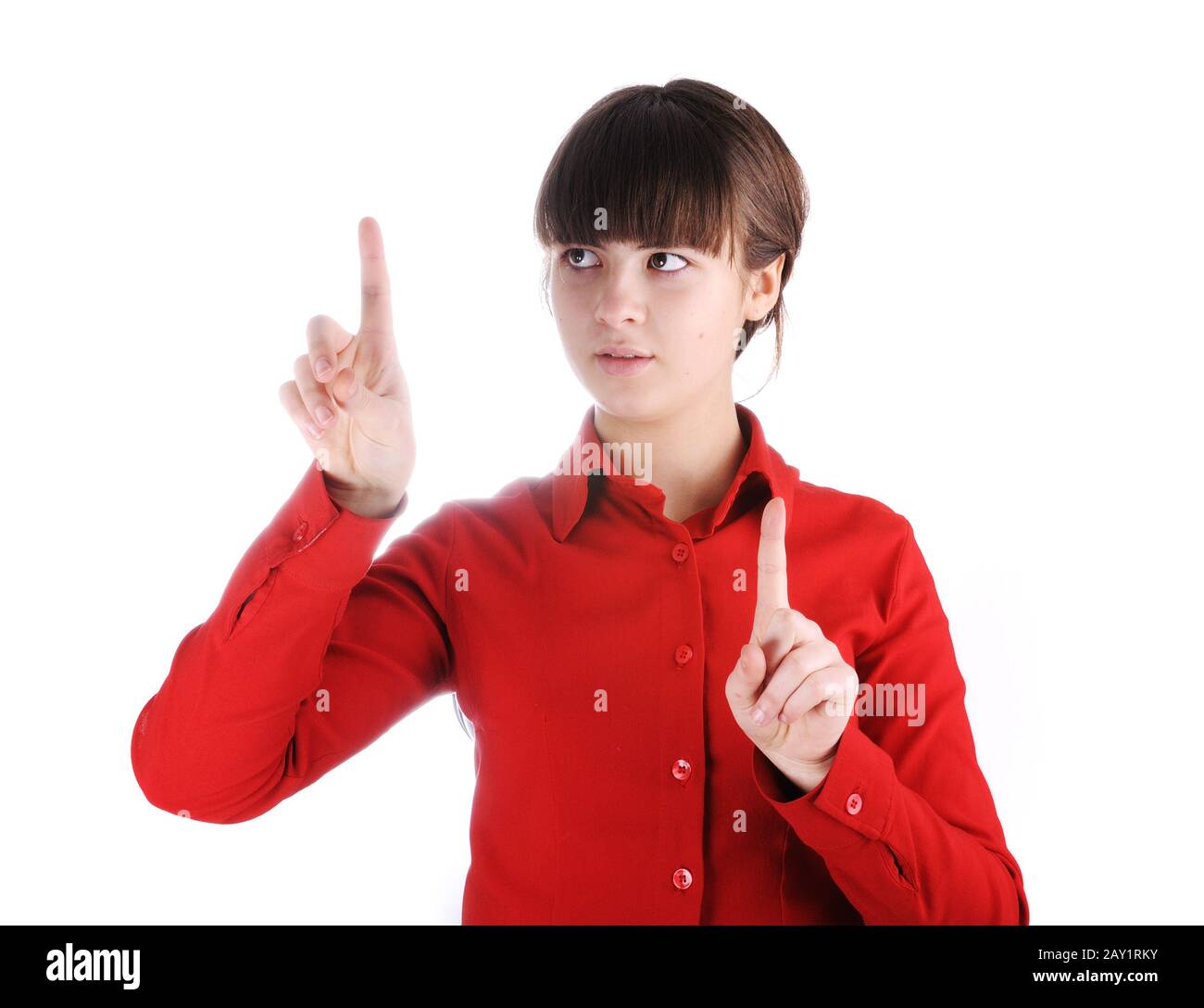 Brunette teenager female touching virtual pad transparent key with ...