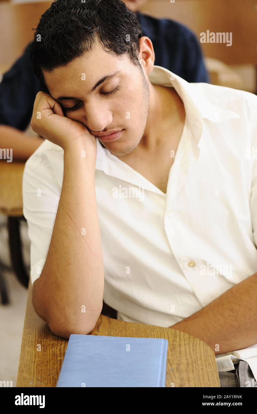 Teen student sleeping at lecture time, college Stock Photo - Alamy