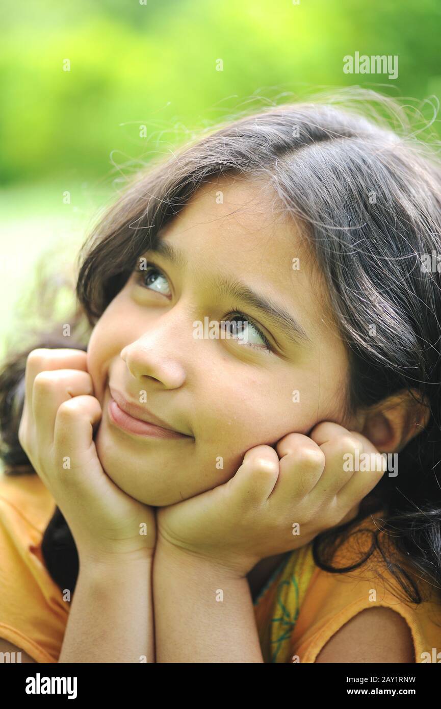 Beautiful girl thinking Stock Photo - Alamy