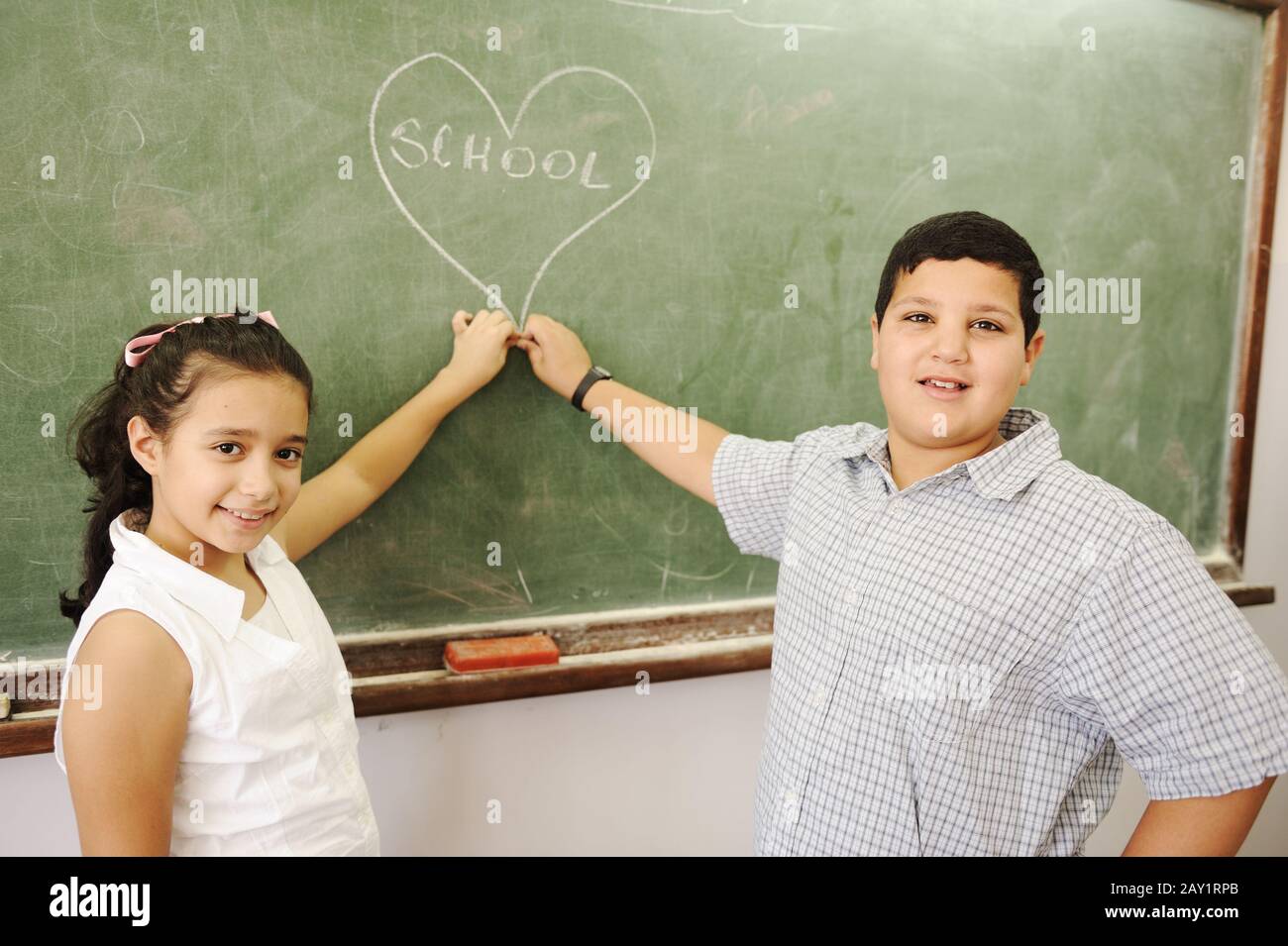 Education activities in classroom at school, happy children learning ...
