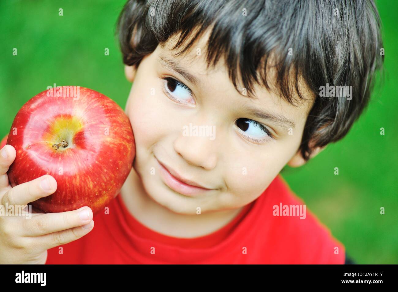 Eating an apple Stock Photo - Alamy