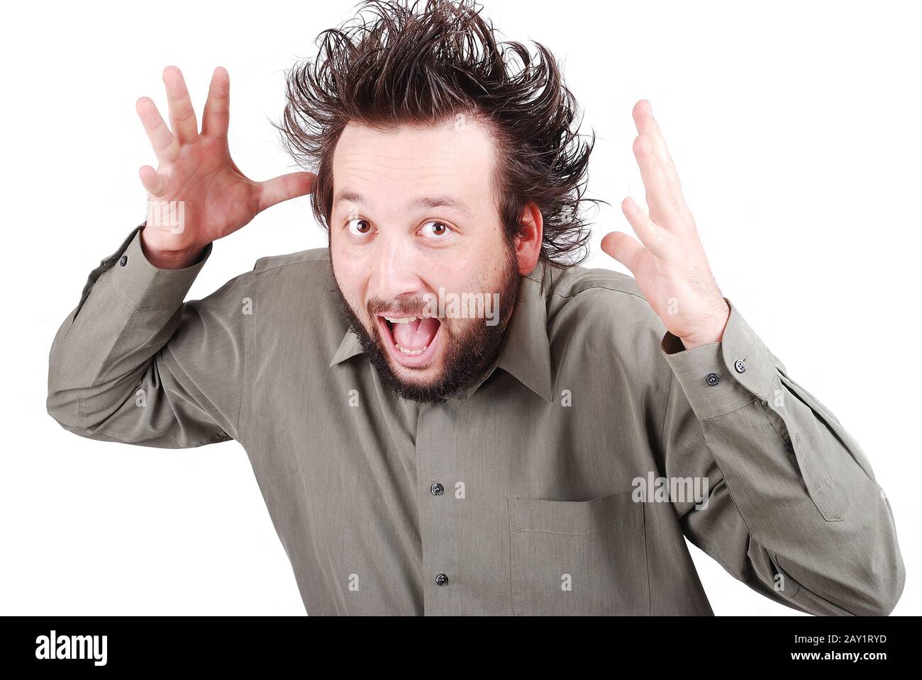 Young male model with funny hair with expression on face Stock Photo ...