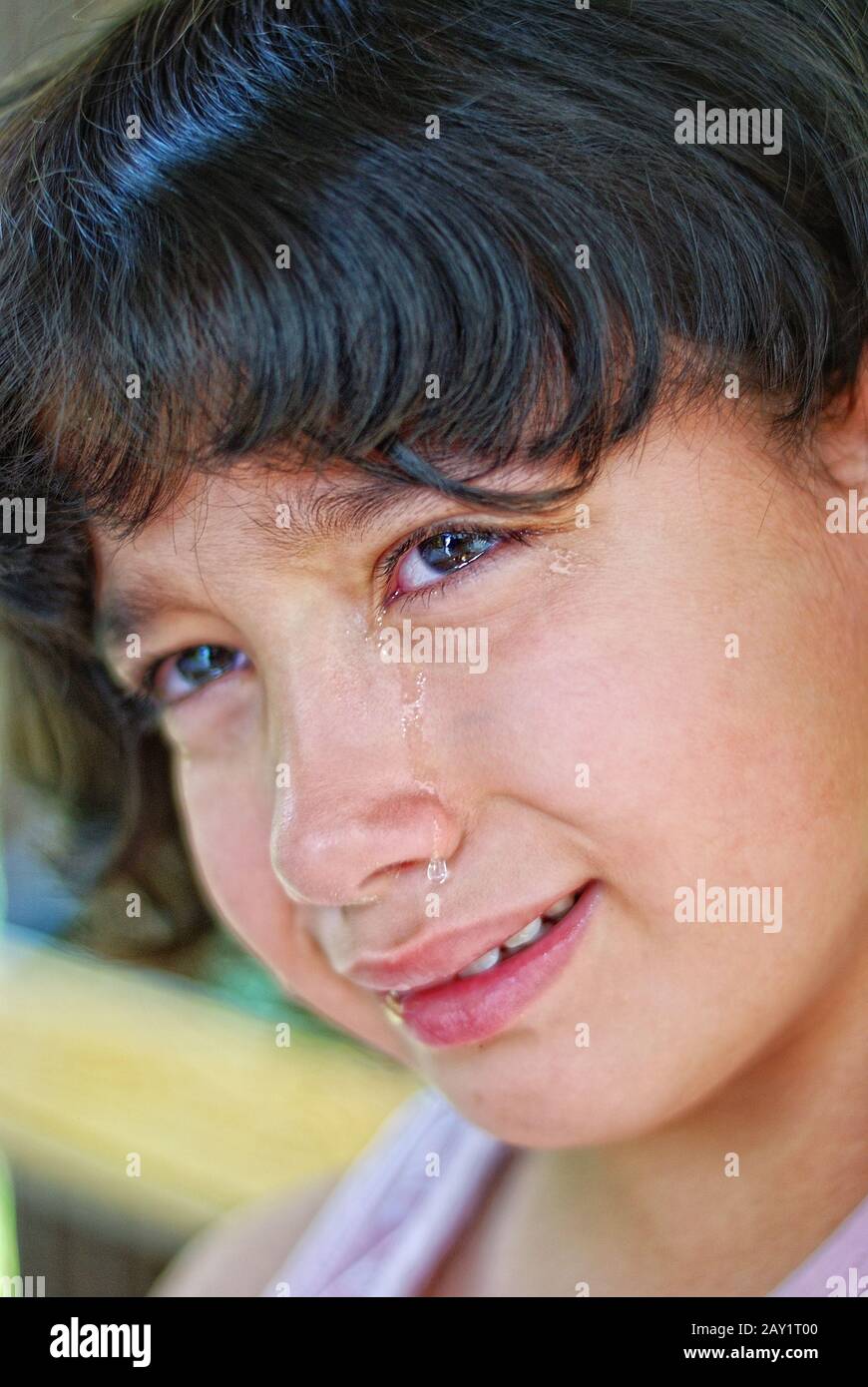 Cute girl with true emotional tears Stock Photo - Alamy