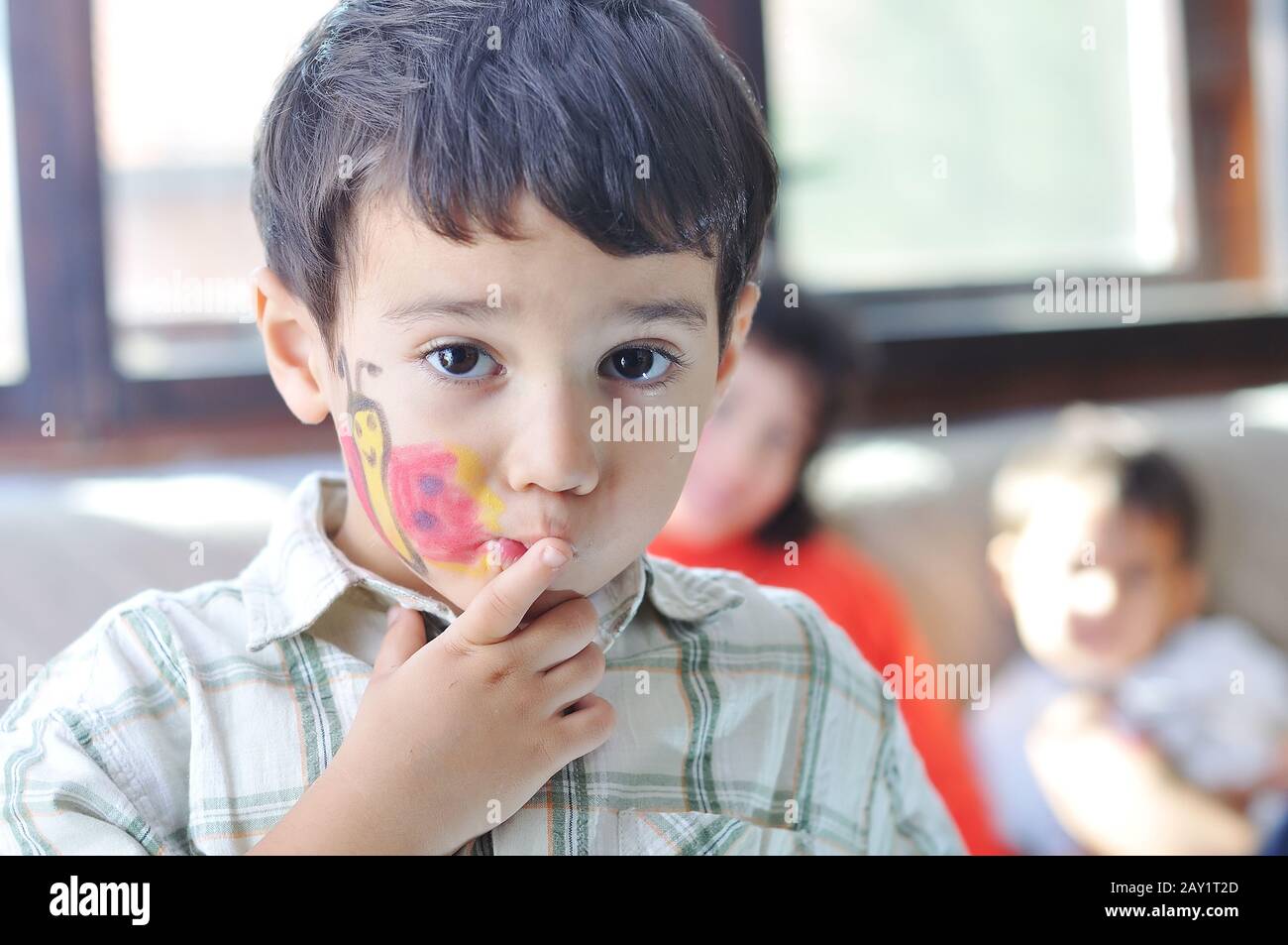 Cute kid with colors Stock Photo - Alamy