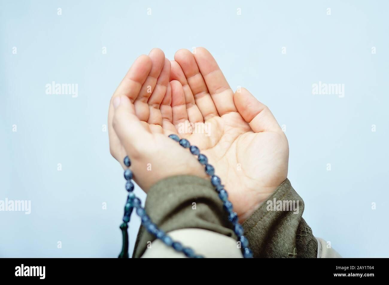 Muslim praying hands hi-res stock photography and images - Alamy