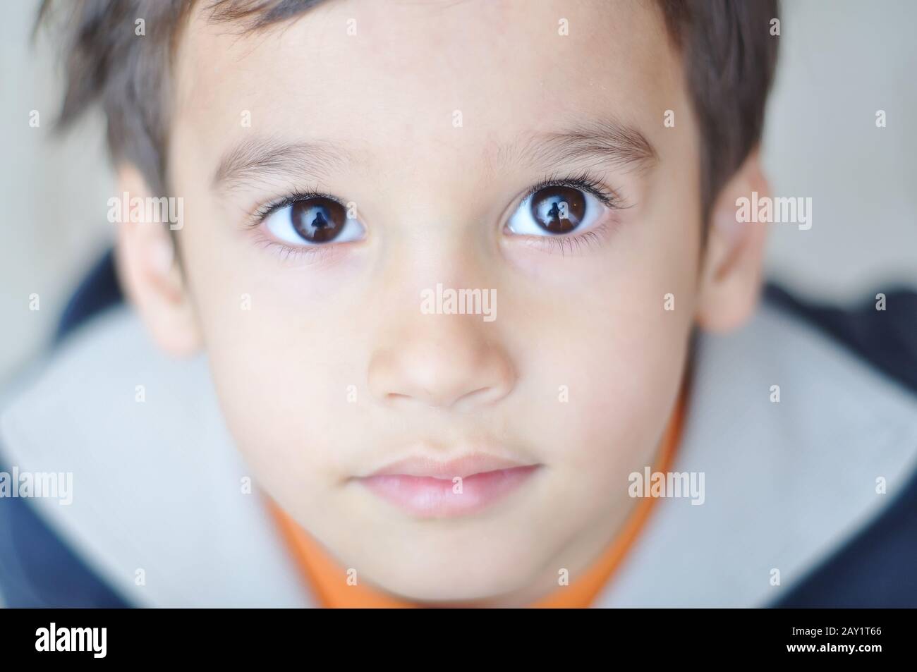 Very positive little cute kid Stock Photo - Alamy