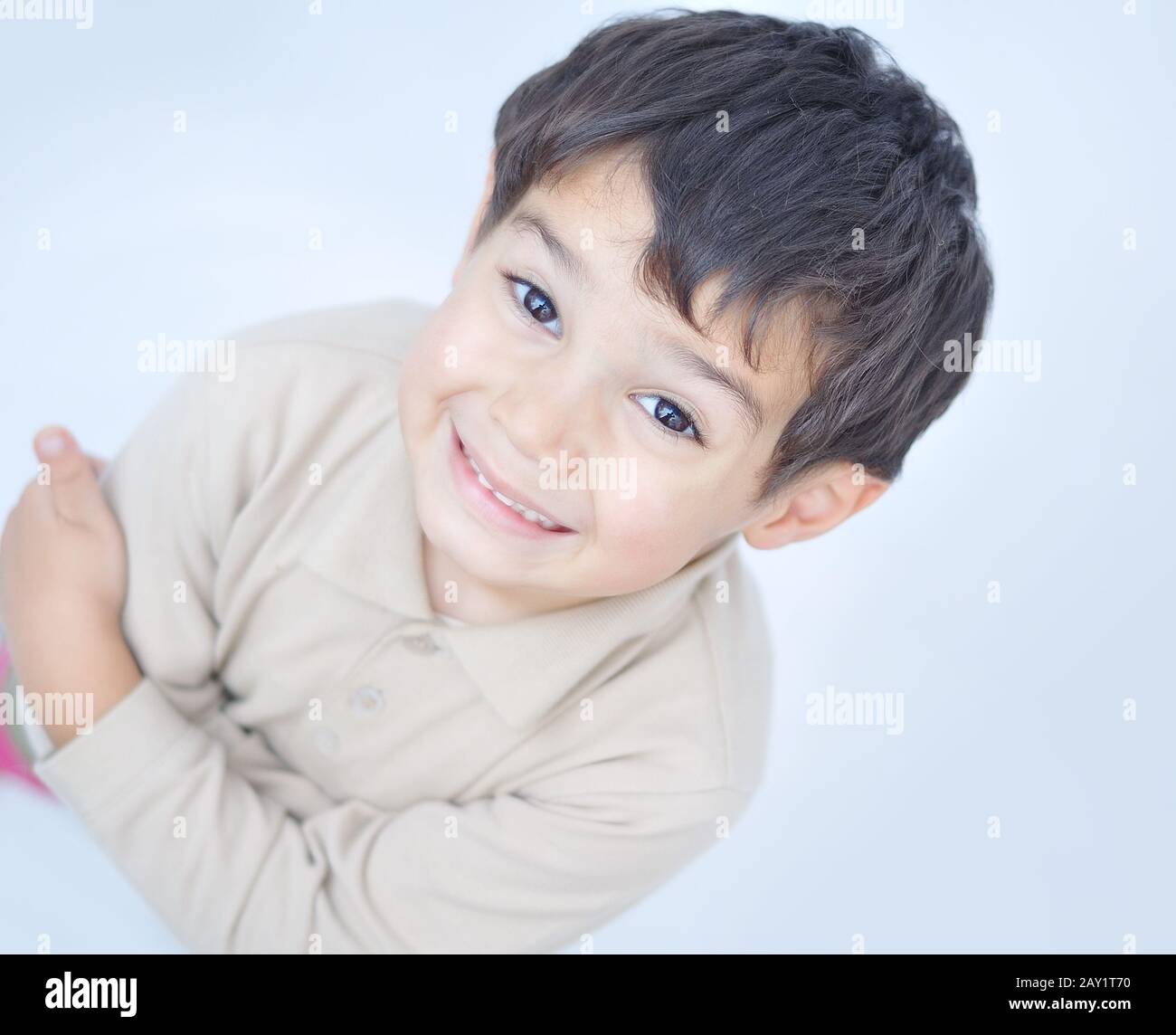 Very positive little cute kid Stock Photo - Alamy
