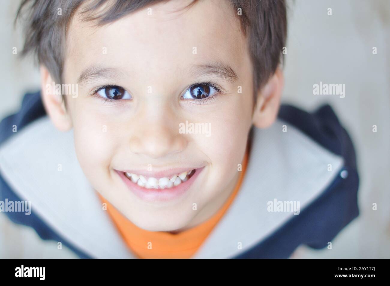 Very positive little cute kid Stock Photo - Alamy