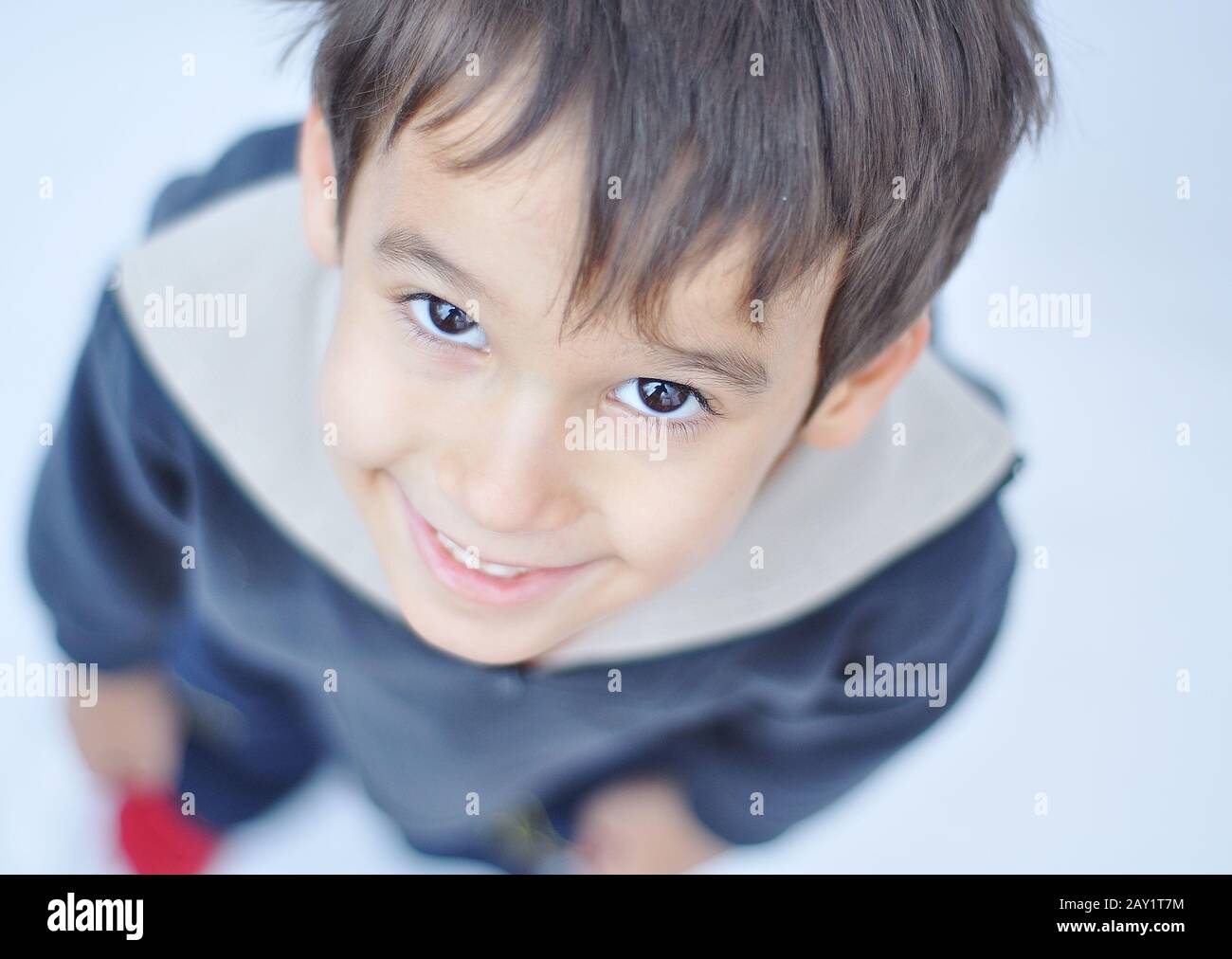 Very positive little cute kid Stock Photo - Alamy