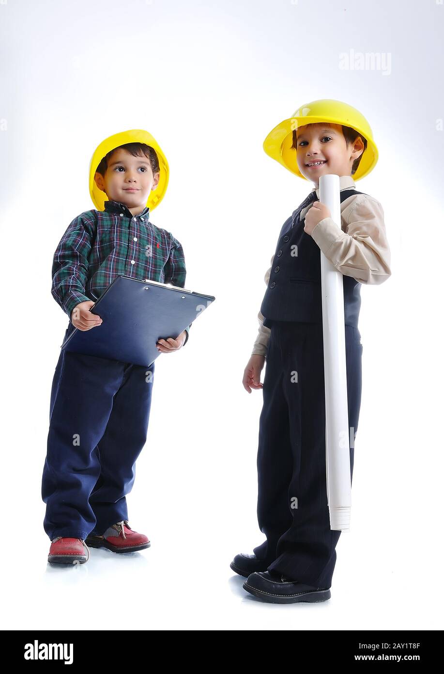 Little cute engineers isolated Stock Photo - Alamy