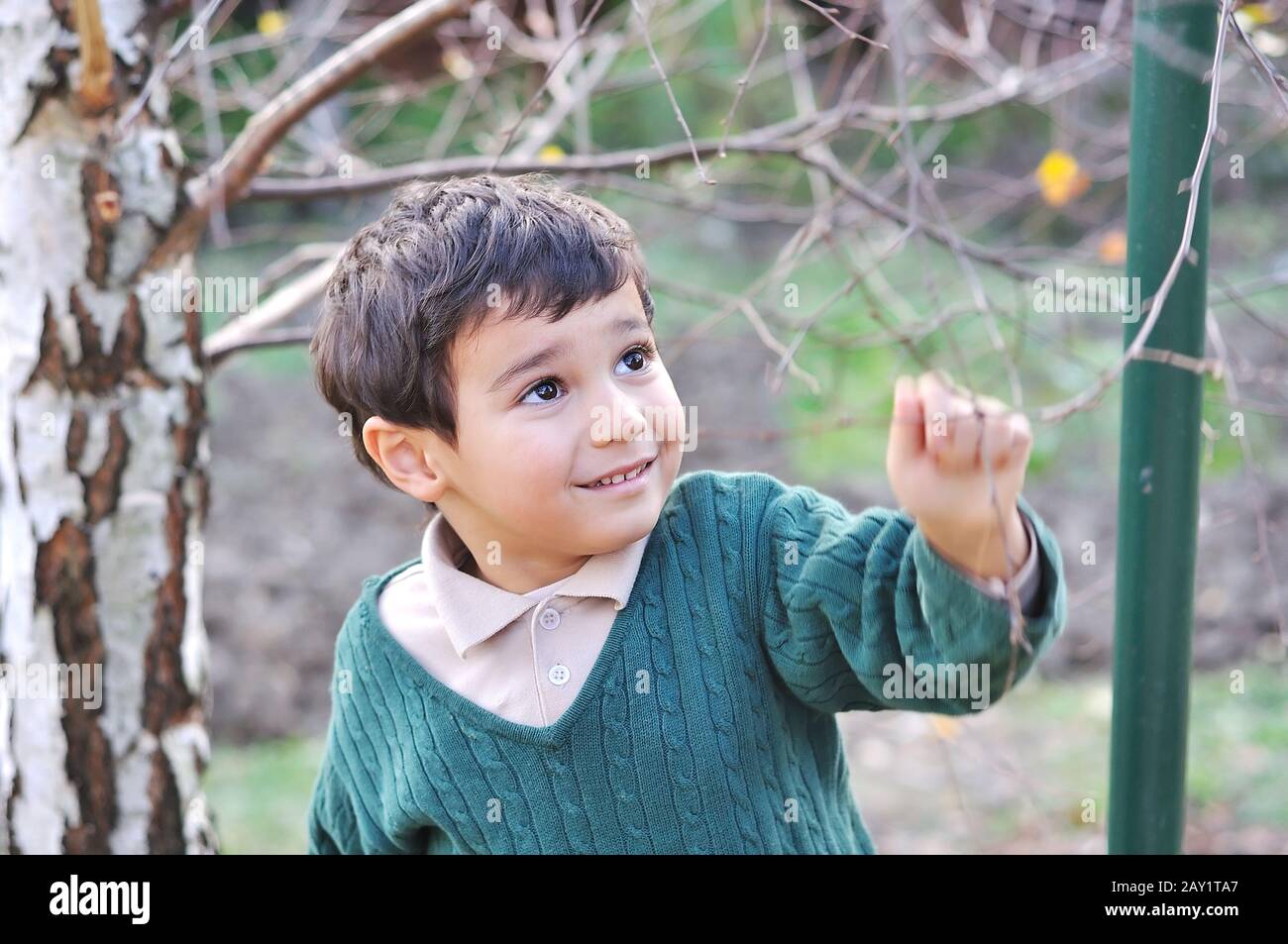 Happy positive cute kid outdoor Stock Photo - Alamy