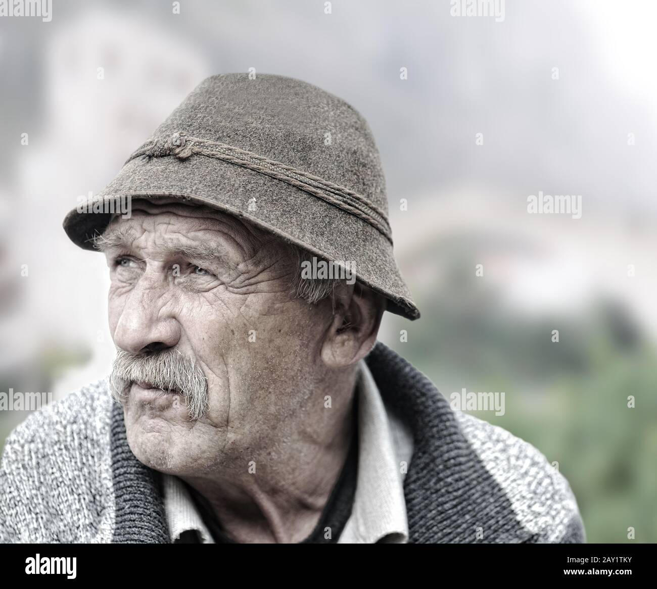 Elderly man's face over white background Stock Photo - Alamy