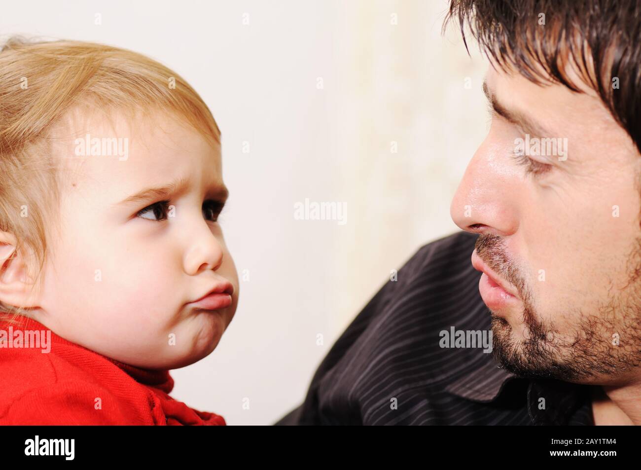 Super cute baby with father Stock Photo - Alamy
