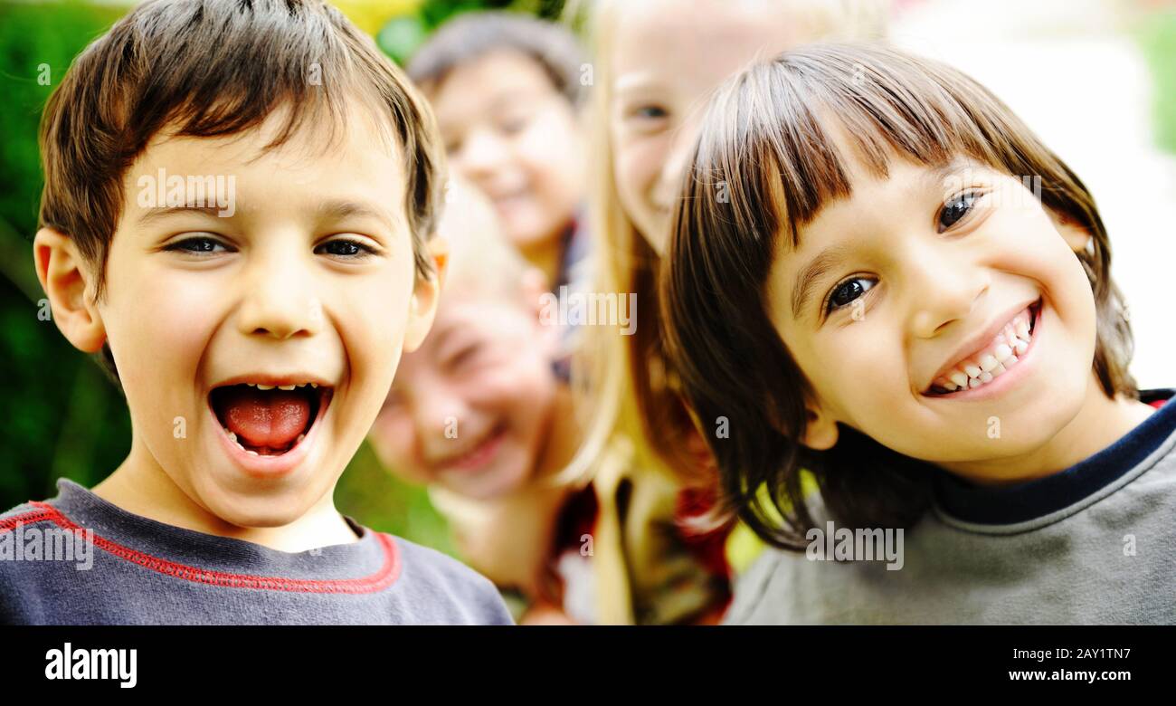 Happiness without limit, happy children together outdoor, faces ...