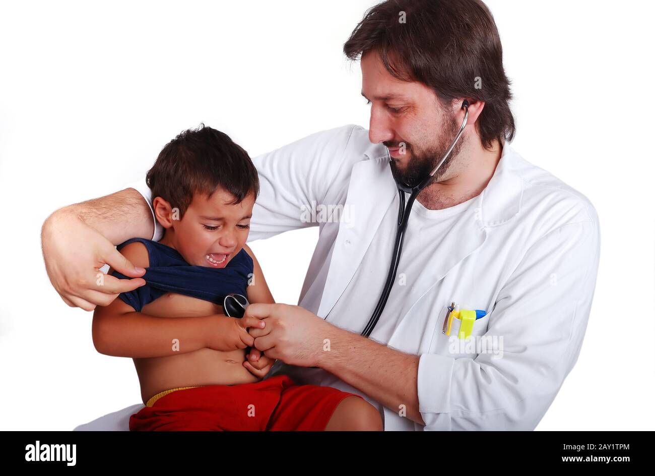 Young male doctor is taking care of little child Stock Photo - Alamy