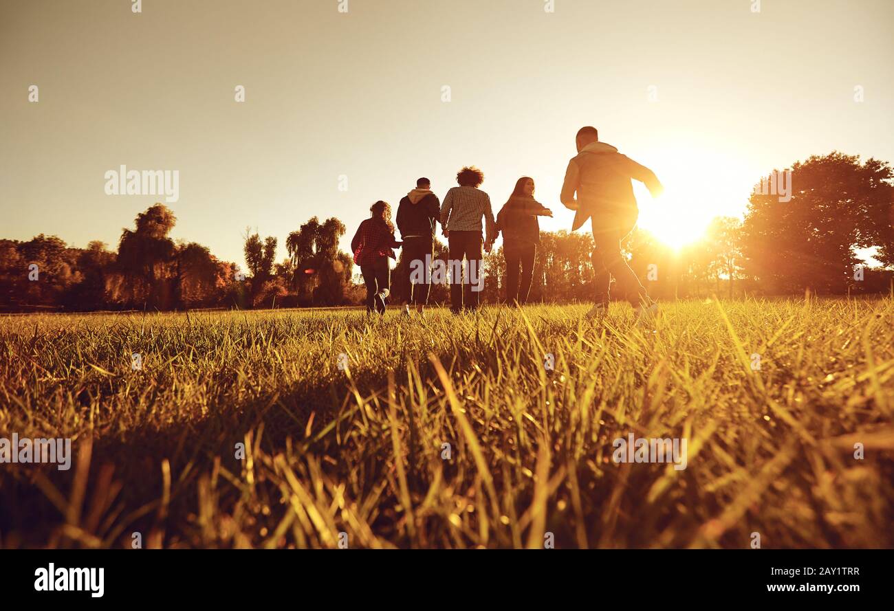 Group People Running Through Park High Resolution Stock Photography and ...