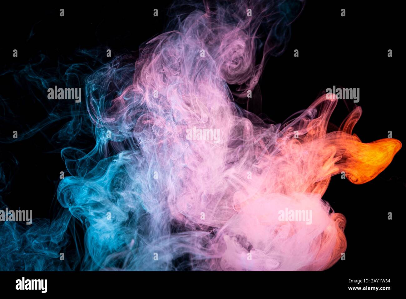 Toxic movement of color smoke abstract on black background, fire design ...