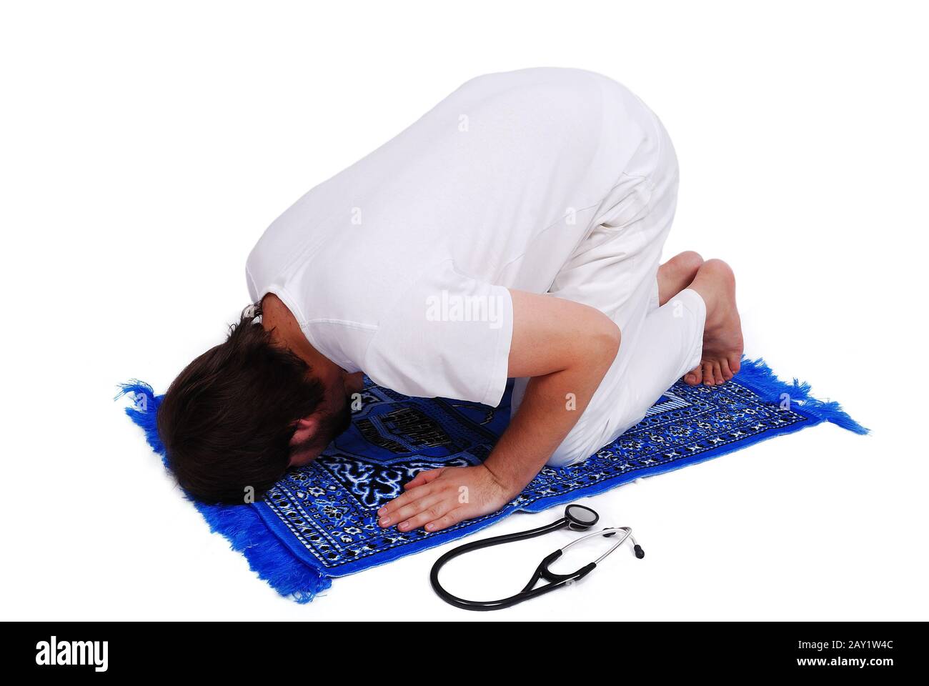 Male muslim doctor is praying Stock Photo - Alamy