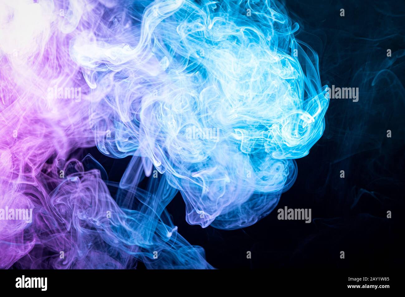 Pattern, Neon pink, blue and purple smoke in the on a dark isolated ...