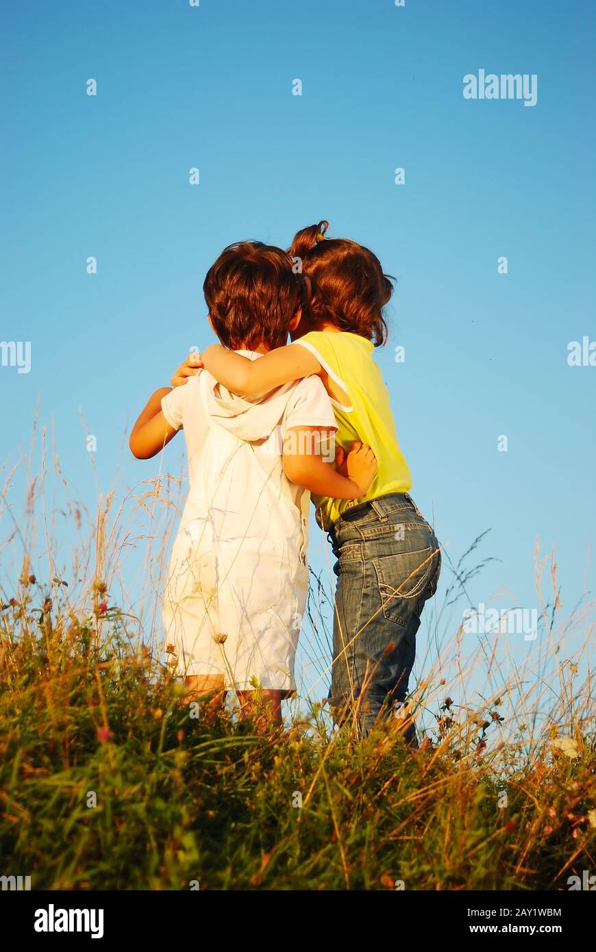 Romantic vision of two children standing together outdoor Stock Photo ...