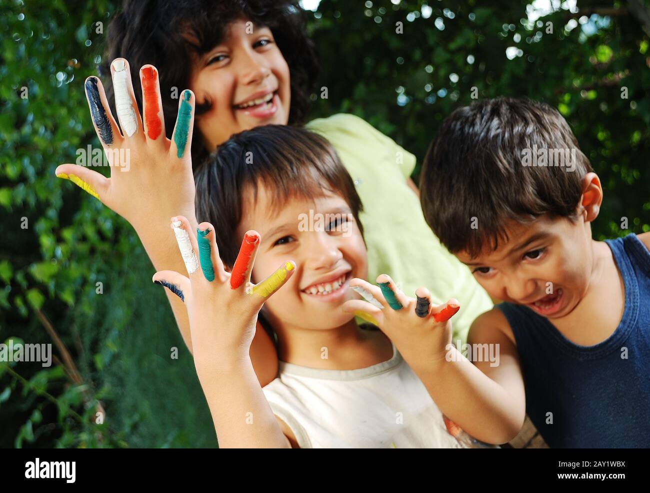 Several colors on children fingers Stock Photo - Alamy