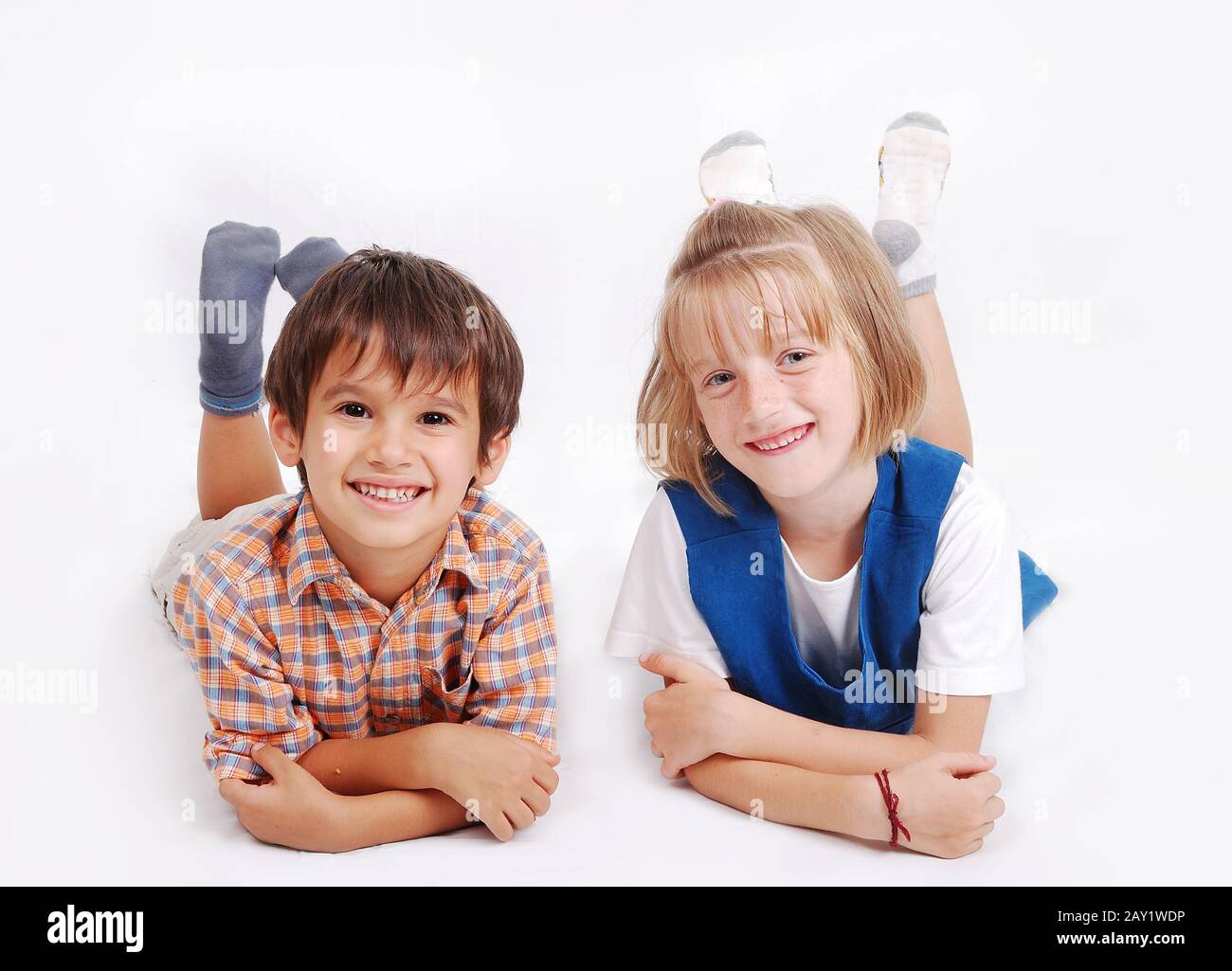Two male and female mates laying down isolated Stock Photo - Alamy