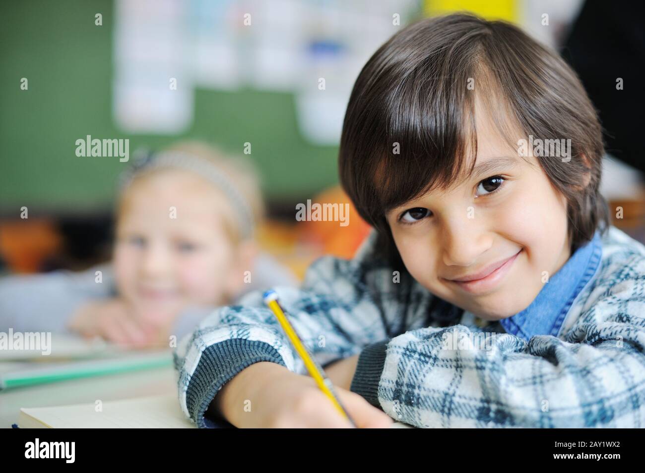 Cute kids in school Stock Photo - Alamy