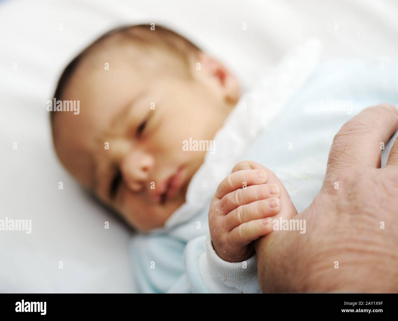 Closeup portrait cute arabic newborn hi-res stock photography and ...