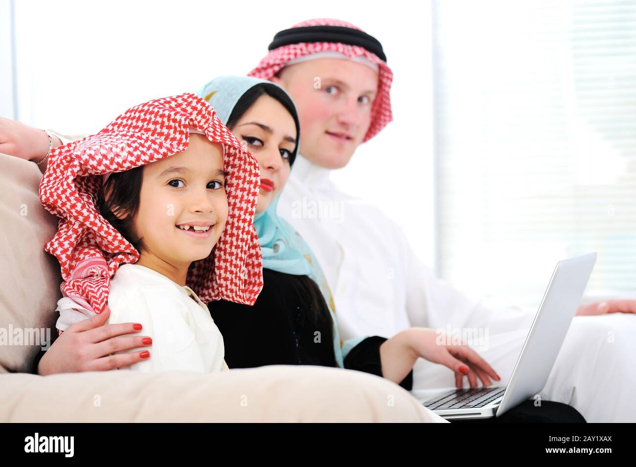Arabic happy family at home Stock Photo - Alamy