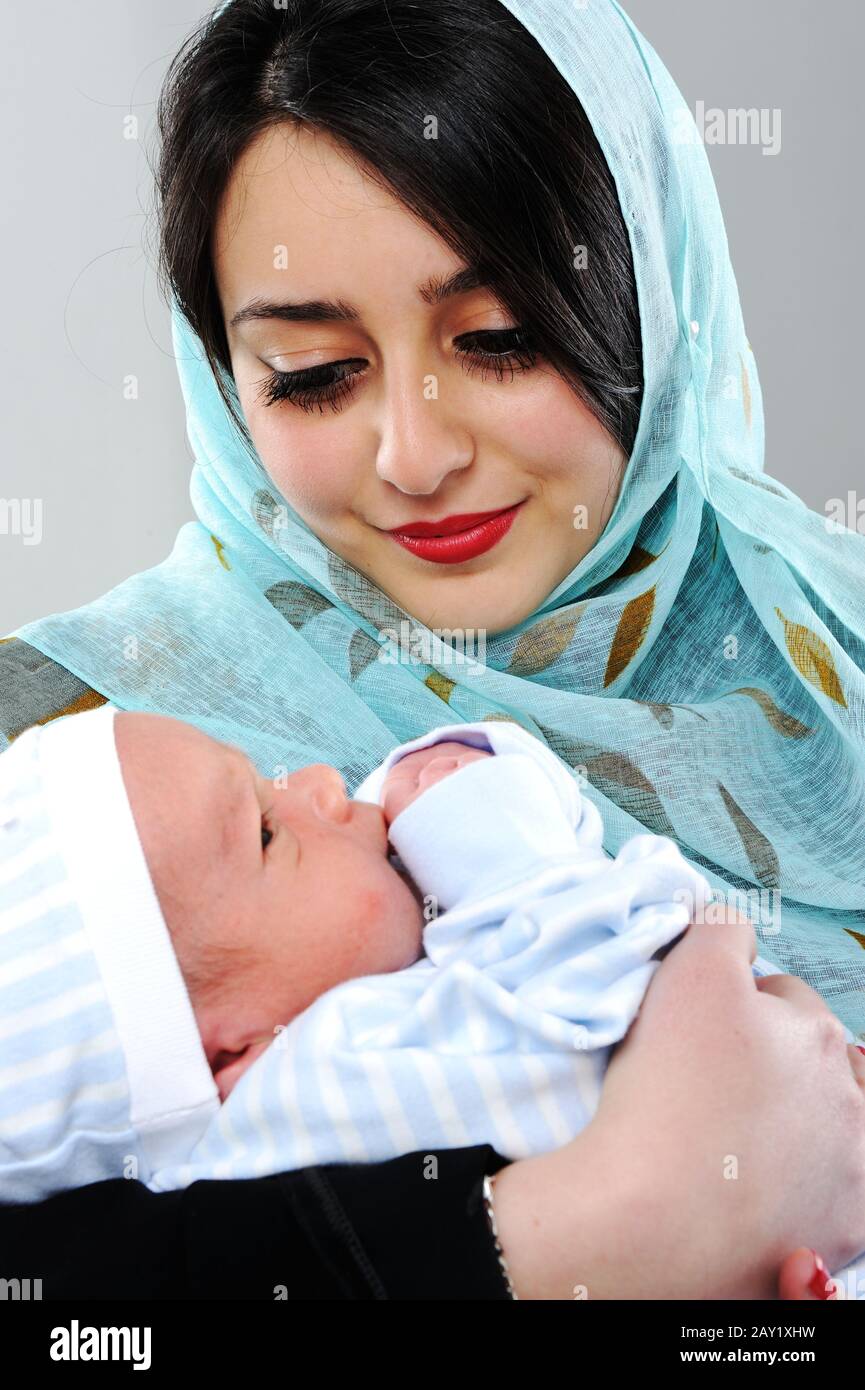 Arabic woman with her baby Stock Photo - Alamy