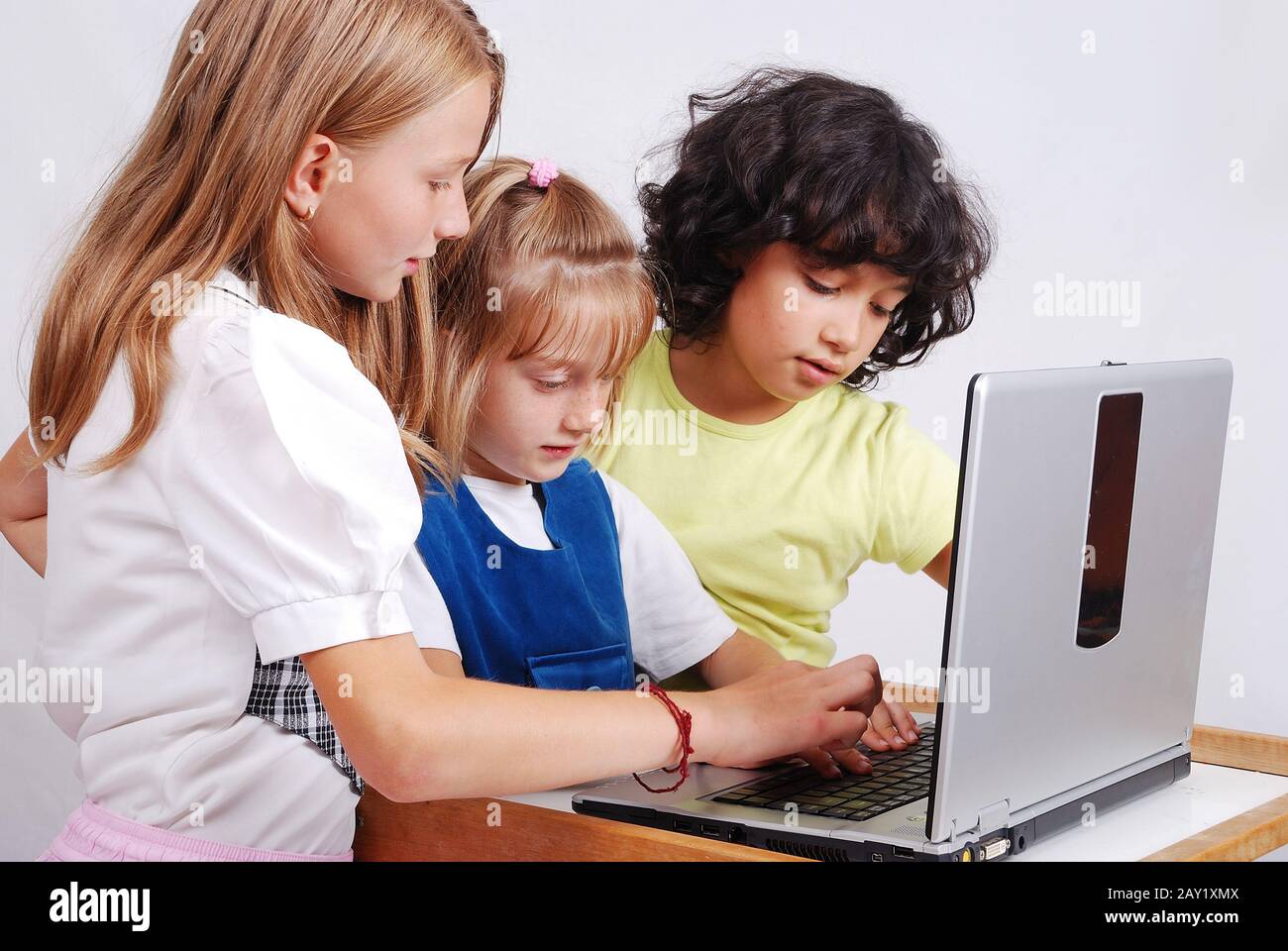 Children activities on laptop put on desk Stock Photo - Alamy