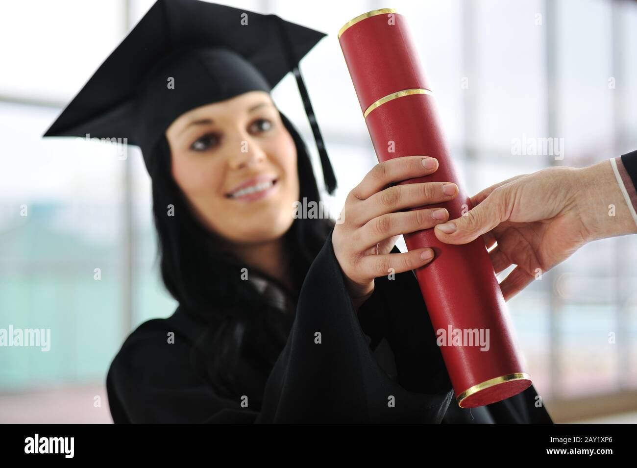 Receiving diploma hi-res stock photography and images - Alamy