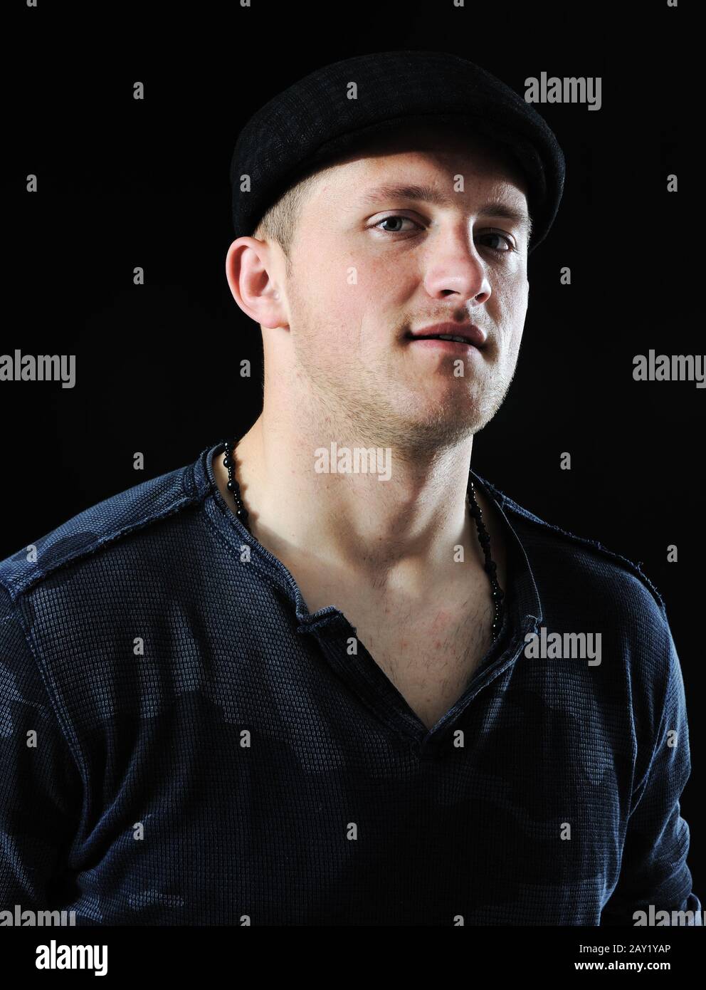 Young macho man in different poses Stock Photo - Alamy